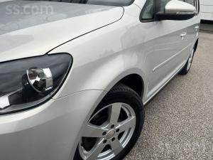 Grey Volkswagen Touran 2013 in Riga, with an engine capacity of 1.40 L and mileage of 219 thousand km for 5450 €, photo 17 on AUTOMOTO.COM.LV
