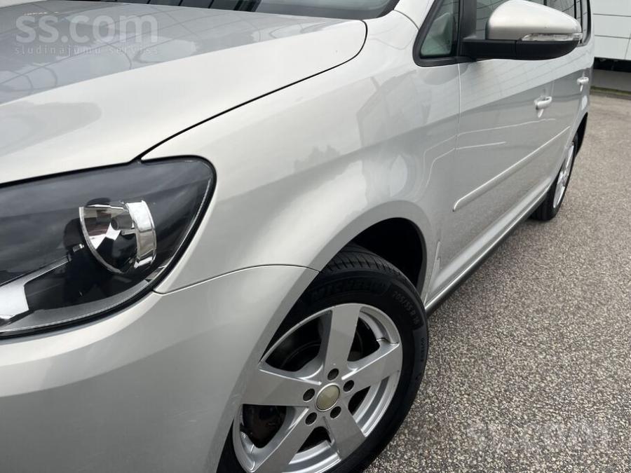 Grey Volkswagen Touran 2013 in Riga, with an engine capacity of 1.40 L and mileage of 219 thousand km for 5450 €, photo 17 on AUTOMOTO.COM.LV