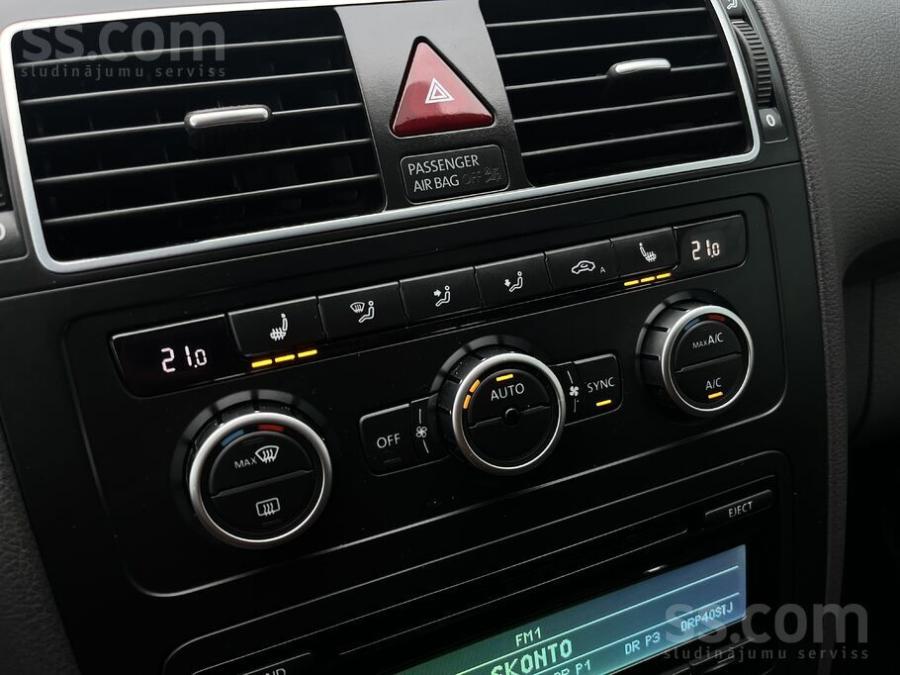 Grey Volkswagen Touran 2013 in Riga, with an engine capacity of 1.40 L and mileage of 219 thousand km for 5450 €, photo 18 on AUTOMOTO.COM.LV
