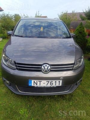 Grey Volkswagen Touran 2013 in Riga, with an engine capacity of 1.60 L and mileage of 251 thousand km for 5100 €, photo 4 on AUTOMOTO.COM.LV