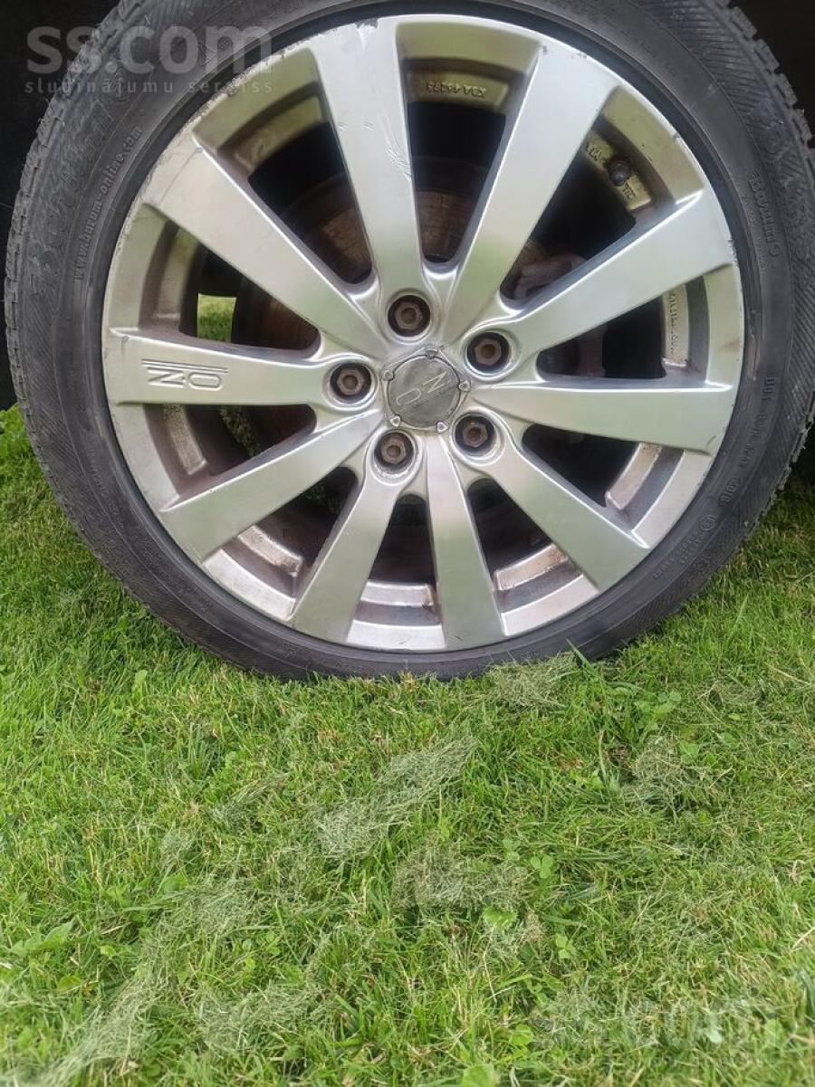 Grey Volkswagen Touran 2013 in Riga, with an engine capacity of 1.60 L and mileage of 251 thousand km for 5100 €, photo 14 on AUTOMOTO.COM.LV