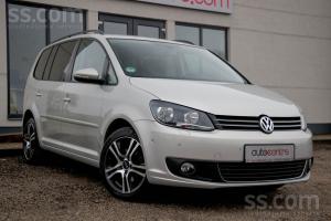 Grey Volkswagen Touran 2014 in Tukums, with an engine capacity of 1.60 L and mileage of 261 thousand km for 6400 €, photo 2 on AUTOMOTO.COM.LV