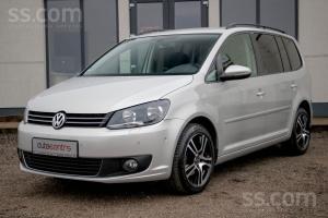 Grey Volkswagen Touran 2014 in Tukums, with an engine capacity of 1.60 L and mileage of 261 thousand km for 6400 €, photo 3 on AUTOMOTO.COM.LV