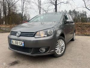Grey Volkswagen Touran 2014 in Vilnius, with an engine capacity of 1.60 L and mileage of 211 thousand km for 6500 €, photo  on AUTOMOTO.COM.LV