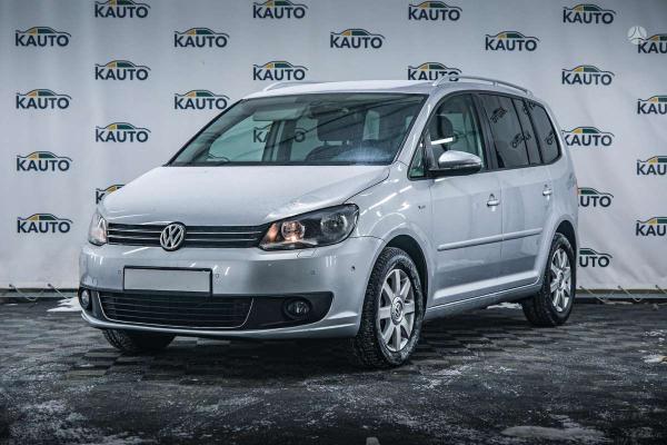 Grey Volkswagen Touran 2014 in Kaunas, with an engine capacity of 1.60 L and mileage of 210 thousand km for 7790 €, photo 1 on AUTOMOTO.COM.LV