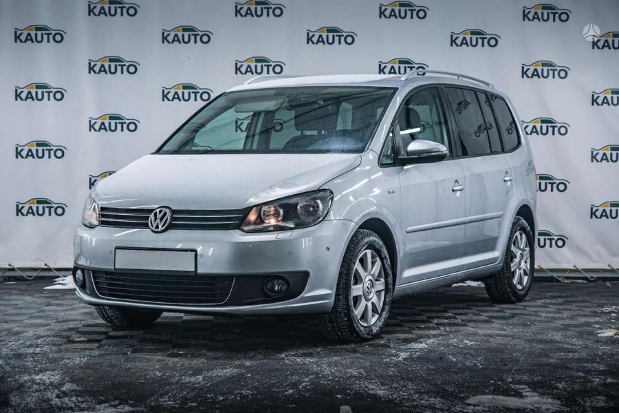 Grey Volkswagen Touran 2014 in Kaunas, with an engine capacity of 1.60 L and mileage of 210 thousand km for 7790 €, photo 1 on AUTOMOTO.COM.LV