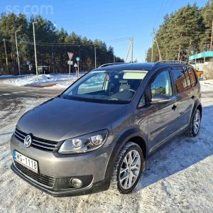 Pelēks Volkswagen Touran 2014 Rīga, ar dzinēja tilpumu 2.00 L un nobraukumu 358 tūkst. km par 6900 €, foto  vietnē AUTOMOTO.COM.LV