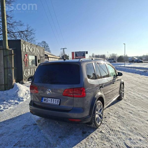 Grey Volkswagen Touran 2014 in Riga, with an engine capacity of 2.00 L and mileage of 358 thousand km for 6900 €, photo 2 on AUTOMOTO.COM.LV