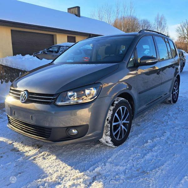 Grey Volkswagen Touran 2014 in Siauliai, with an engine capacity of 1.60 L and mileage of 247 thousand km for 5450 €, photo 6 on AUTOMOTO.COM.LV