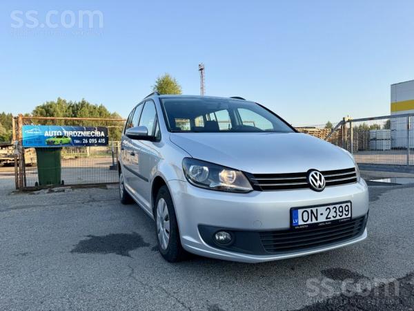 Grey Volkswagen Touran 2014 in Valmiera, with an engine capacity of 1.60 L and mileage of 311 thousand km for 5900 €, photo 1 on AUTOMOTO.COM.LV