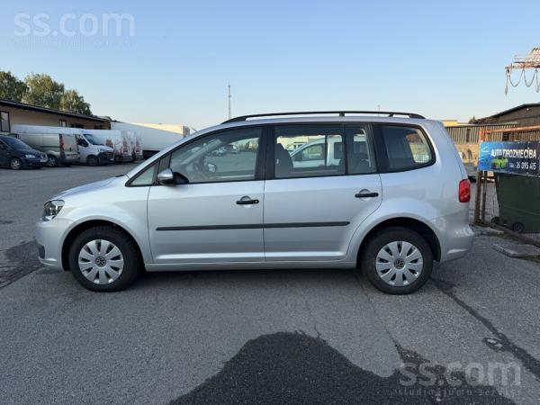 Grey Volkswagen Touran 2014 in Valmiera, with an engine capacity of 1.60 L and mileage of 311 thousand km for 5900 €, photo 5 on AUTOMOTO.COM.LV