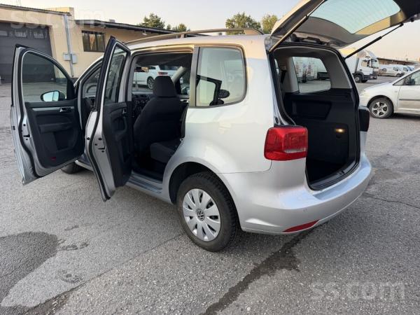 Grey Volkswagen Touran 2014 in Valmiera, with an engine capacity of 1.60 L and mileage of 311 thousand km for 5900 €, photo 7 on AUTOMOTO.COM.LV