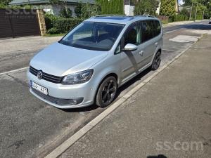 Grey Volkswagen Touran 2014 in Riga, with an engine capacity of 2.00 L and mileage of 193 thousand km for 8900 €, photo  on AUTOMOTO.COM.LV