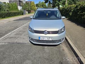 Grey Volkswagen Touran 2014 in Riga, with an engine capacity of 2.00 L and mileage of 193 thousand km for 8900 €, photo 3 on AUTOMOTO.COM.LV