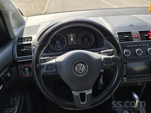 Grey Volkswagen Touran 2014 in Riga, with an engine capacity of 2.00 L and mileage of 193 thousand km for 8900 €, photo 7 on AUTOMOTO.COM.LV