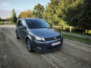 Grey Volkswagen Touran 2014 in Telschi, with an engine capacity of 1.60 L and mileage of 235 thousand km for 6200 €, photo 4 on AUTOMOTO.COM.LV