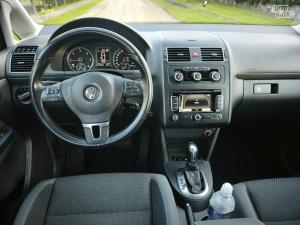 Grey Volkswagen Touran 2014 in Telschi, with an engine capacity of 1.60 L and mileage of 235 thousand km for 6200 €, photo 15 on AUTOMOTO.COM.LV