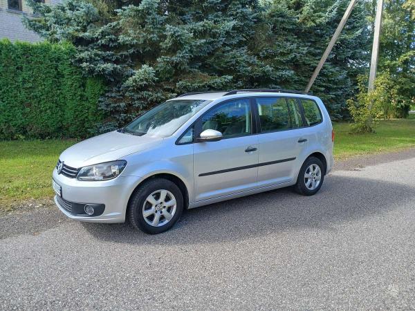 Grey Volkswagen Touran 2014 in Utena, with an engine capacity of 1.60 L and mileage of 313 thousand km for 5700 €, photo 1 on AUTOMOTO.COM.LV