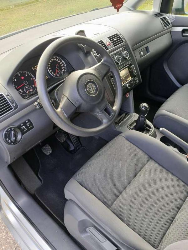 Grey Volkswagen Touran 2014 in Utena, with an engine capacity of 1.60 L and mileage of 313 thousand km for 5700 €, photo 5 on AUTOMOTO.COM.LV