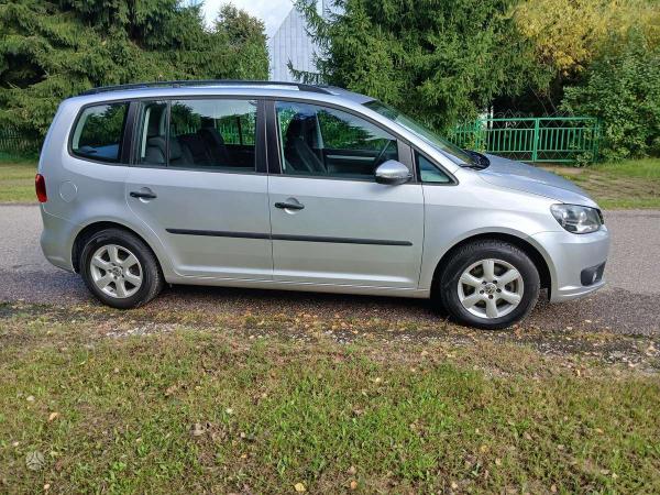 Grey Volkswagen Touran 2014 in Utena, with an engine capacity of 1.60 L and mileage of 313 thousand km for 5700 €, photo 10 on AUTOMOTO.COM.LV