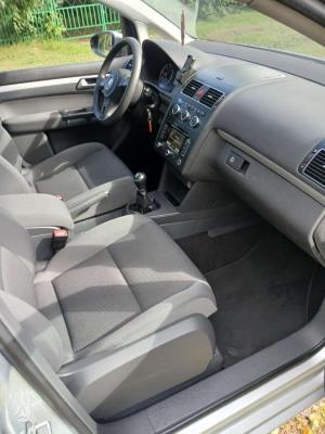 Grey Volkswagen Touran 2014 in Utena, with an engine capacity of 1.60 L and mileage of 313 thousand km for 5700 €, photo 11 on AUTOMOTO.COM.LV