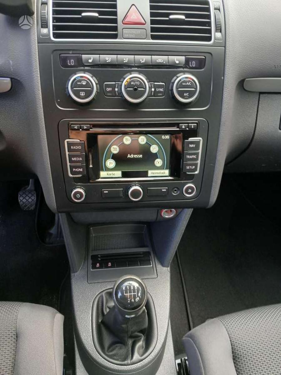 Grey Volkswagen Touran 2014 in Utena, with an engine capacity of 1.60 L and mileage of 313 thousand km for 5700 €, photo 13 on AUTOMOTO.COM.LV