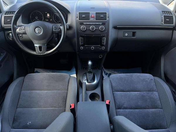 Grey Volkswagen Touran 2015 in Vilnius, with an engine capacity of 1.97 L and mileage of 261 thousand km for 7500 €, photo 11 on AUTOMOTO.COM.LV