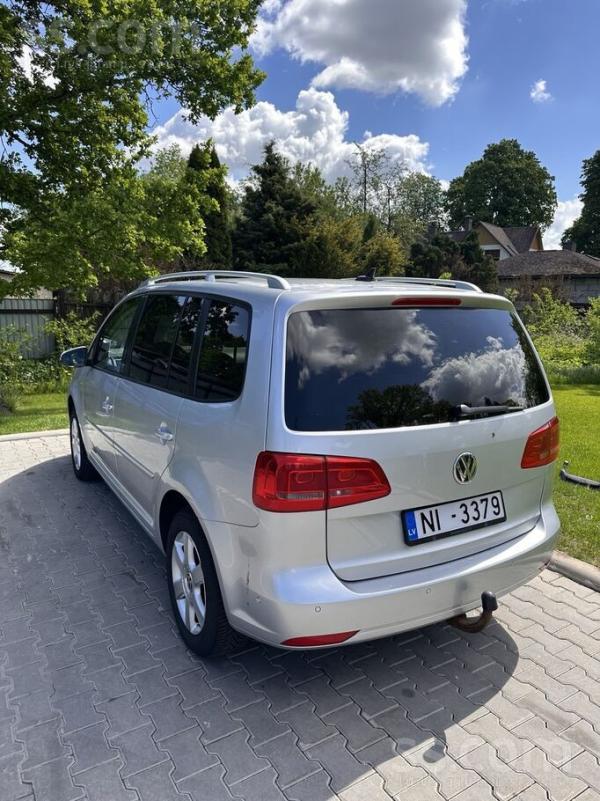 Grey Volkswagen Touran 2015 in Riga, with an engine capacity of 2.00 L and mileage of 365 thousand km for 6390 €, photo 2 on AUTOMOTO.COM.LV