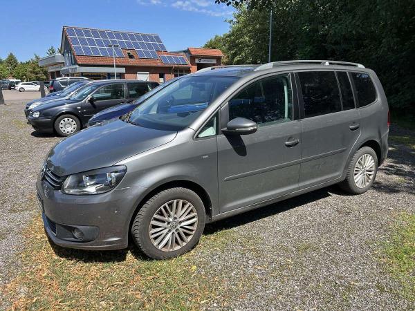 Grey Volkswagen Touran 2015 in Kaunas, with an engine capacity of 1.97 L and mileage of 245 thousand km for 5250 €, photo 5 on AUTOMOTO.COM.LV