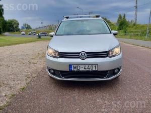 Pelēks Volkswagen Touran 2015 Rīga, ar dzinēja tilpumu 2.00 L un nobraukumu 322 tūkst. km par 7250 €, foto 3 vietnē AUTOMOTO.COM.LV