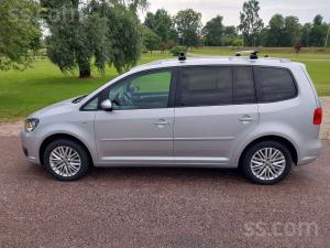 Pelēks Volkswagen Touran 2015 Rīga, ar dzinēja tilpumu 2.00 L un nobraukumu 322 tūkst. km par 7250 €, foto 8 vietnē AUTOMOTO.COM.LV
