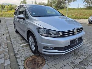 Grey Volkswagen Touran 2015 in Vilnius, with an engine capacity of 1.60 L and mileage of 300 thousand km for 7950 €, photo 3 on AUTOMOTO.COM.LV