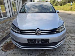 Grey Volkswagen Touran 2015 in Vilnius, with an engine capacity of 1.60 L and mileage of 300 thousand km for 7950 €, photo 4 on AUTOMOTO.COM.LV