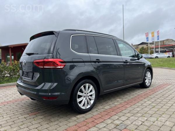 Volkswagen Touran 2015 in Cesis on AUTOMOTO.COM.LV Grey Volkswagen Touran 2015 in Cesis, with an engine capacity of 1.40 L and mileage of 220 thousand km for 11500 €, photo 4 on AUTOMOTO.COM.LV