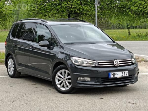 Grey Volkswagen Touran 2016 in Ogre, with an engine capacity of 2.00 L and mileage of 328 thousand km for 9770 €, photo 1 on AUTOMOTO.COM.LV