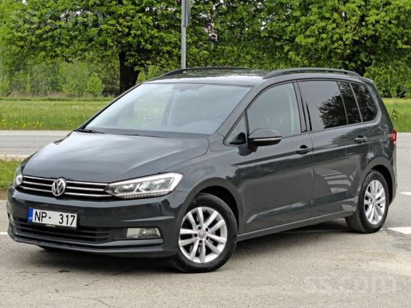 Grey Volkswagen Touran 2016 in Ogre, with an engine capacity of 2.00 L and mileage of 328 thousand km for 9770 €, photo 3 on AUTOMOTO.COM.LV