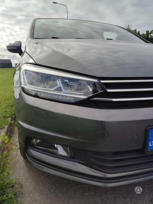 Grey Volkswagen Touran 2016 in Vilnius, with an engine capacity of 1.97 L and mileage of 200 thousand km for 10800 €, photo 6 on AUTOMOTO.COM.LV