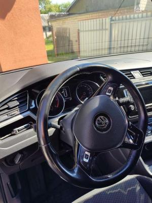 Grey Volkswagen Touran 2016 in Vilnius, with an engine capacity of 1.97 L and mileage of 200 thousand km for 10800 €, photo 14 on AUTOMOTO.COM.LV