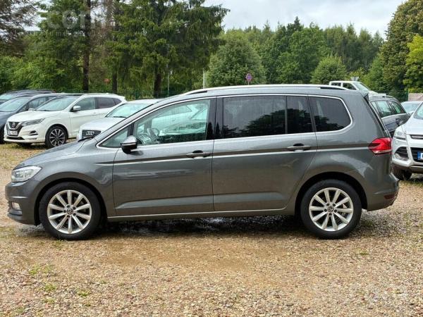 Grey Volkswagen Touran 2016 in Kuldiga, with an engine capacity of 2.00 L and mileage of 291 thousand km for 11990 €, photo 5 on AUTOMOTO.COM.LV