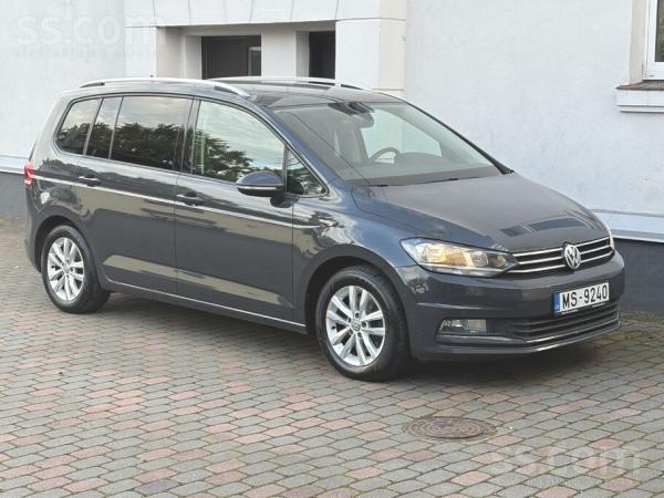 Grey Volkswagen Touran 2016 in Riga, with an engine capacity of 2.00 L and mileage of 247 thousand km for 9900 €, photo 7 on AUTOMOTO.COM.LV