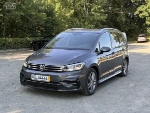 Grey Volkswagen Touran 2017 in Vilnius, with an engine capacity of 2.00 L and mileage of 200 thousand km for 10200 €, photo  on AUTOMOTO.COM.LV