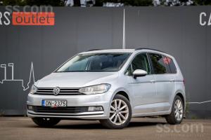 Grey Volkswagen Touran 2017 in Riga, with an engine capacity of 1.60 L and mileage of 208 thousand km for 10990 €, photo  on AUTOMOTO.COM.LV