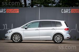 Grey Volkswagen Touran 2017 in Riga, with an engine capacity of 1.60 L and mileage of 208 thousand km for 10990 €, photo 6 on AUTOMOTO.COM.LV