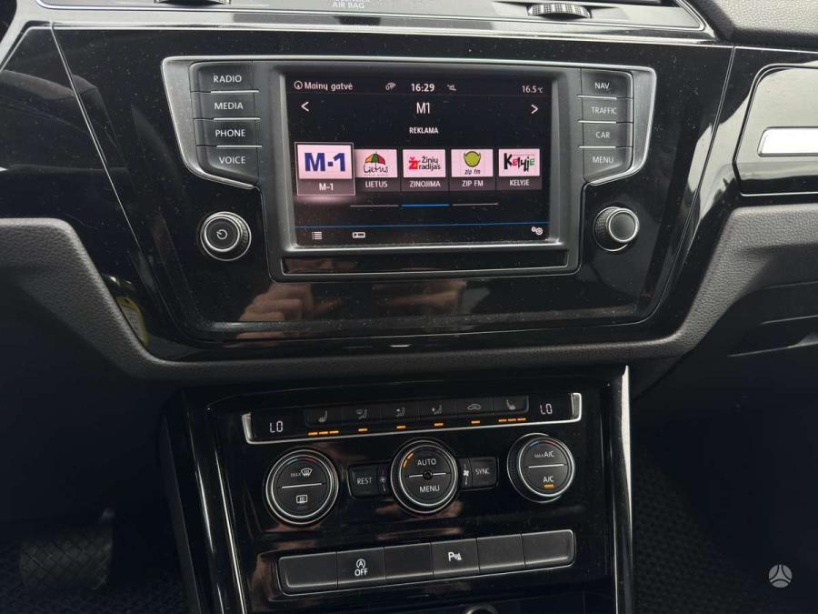 Grey Volkswagen Touran 2017 in Klaipeda, with an engine capacity of 1.80 L and mileage of 298 thousand km for 11999 €, photo 17 on AUTOMOTO.COM.LV