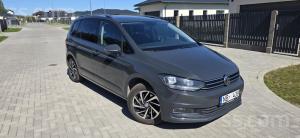 Grey Volkswagen Touran 2019 in Riga, with an engine capacity of 1.60 L and mileage of 287 thousand km for 13900 €, photo 4 on AUTOMOTO.COM.LV