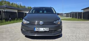 Grey Volkswagen Touran 2019 in Riga, with an engine capacity of 1.60 L and mileage of 287 thousand km for 13900 €, photo 16 on AUTOMOTO.COM.LV