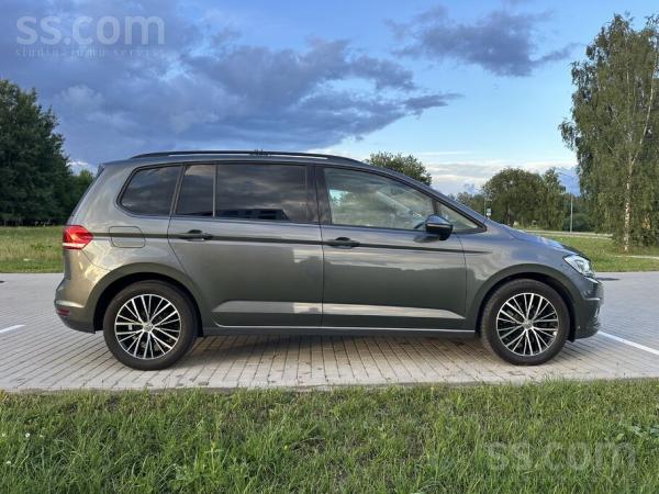 Grey Volkswagen Touran 2019 in Riga, with an engine capacity of 2.00 L and mileage of 179 thousand km for 14000 €, photo 6 on AUTOMOTO.COM.LV