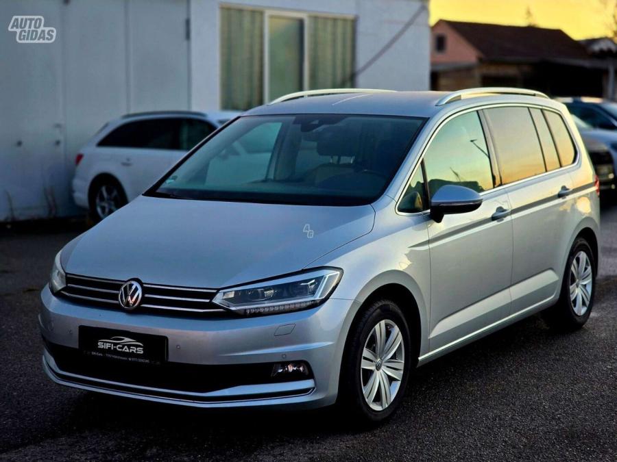 Grey Volkswagen Touran 2020 in Kaunas, with an engine capacity of 2.00 L and mileage of 92 thousand km for 23783 €, photo 3 on AUTOMOTO.COM.LV
