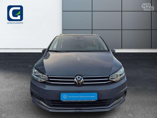 Grey Volkswagen Touran 2023 in Kaunas, with an engine capacity of 1.50 L and mileage of 23 thousand km for 32556 €, photo 2 on AUTOMOTO.COM.LV