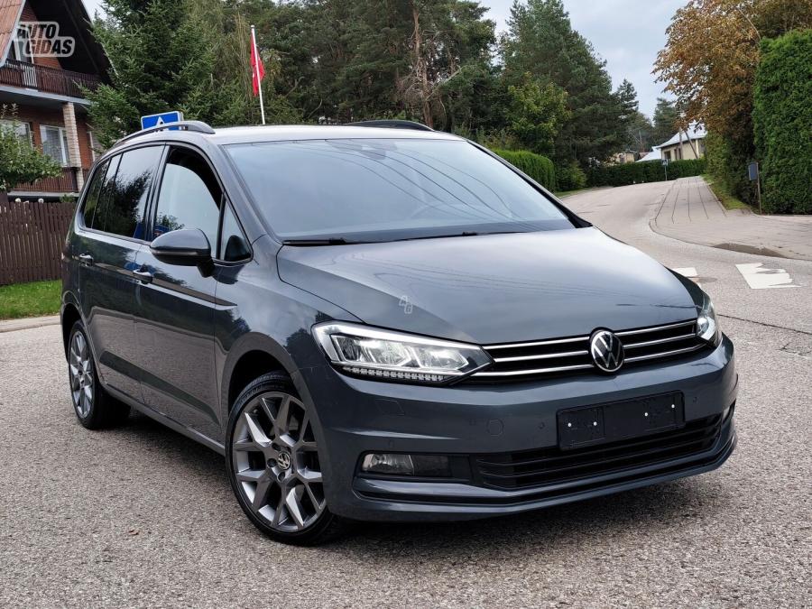 Grey Volkswagen Touran 2023 in Anyksciai, with an engine capacity of 2.00 L and mileage of 310 thousand km for 13250 €, photo 1 on AUTOMOTO.COM.LV